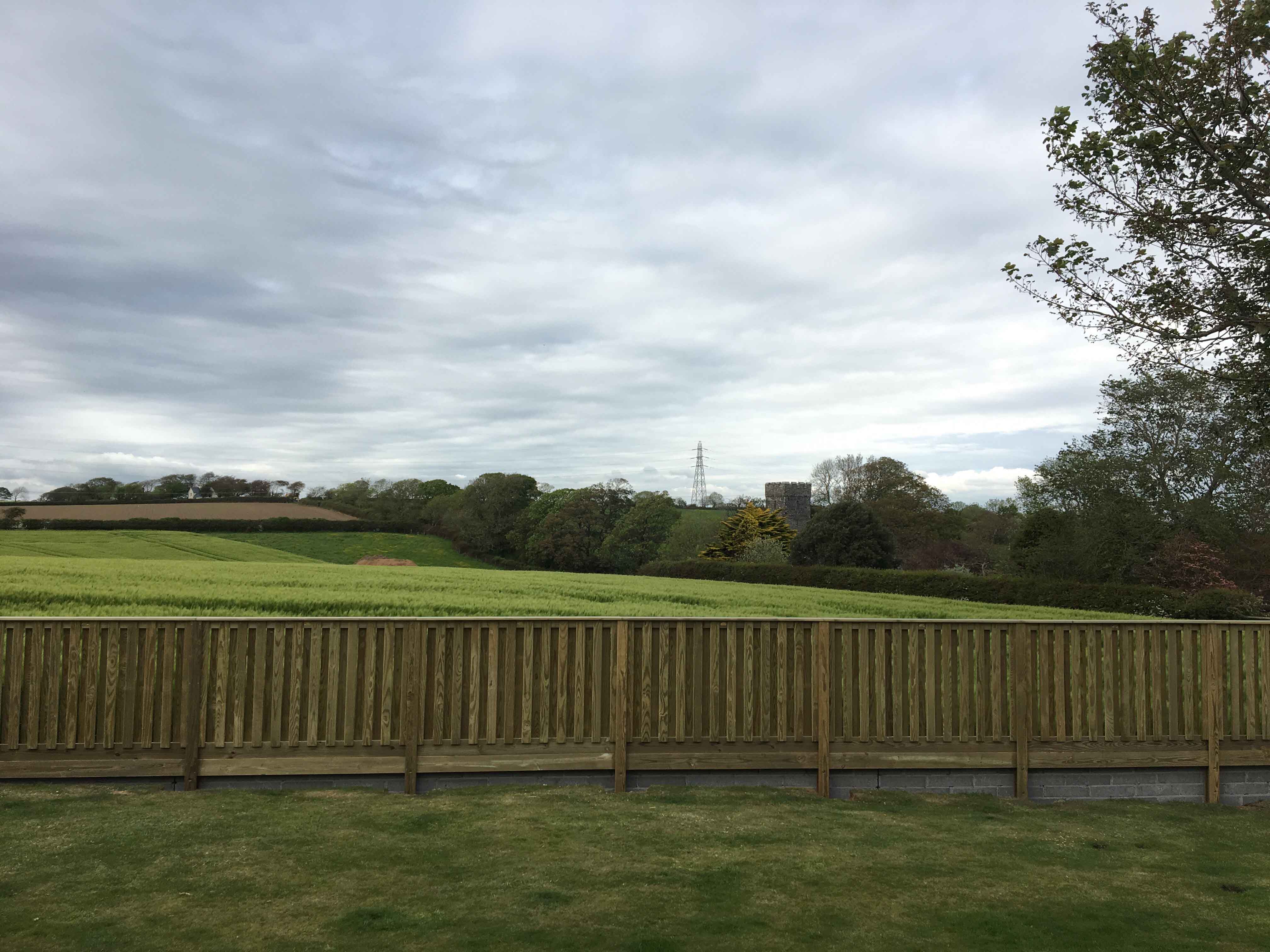 Wind resistant fencing protects rural family garden | Jacksons Fencing