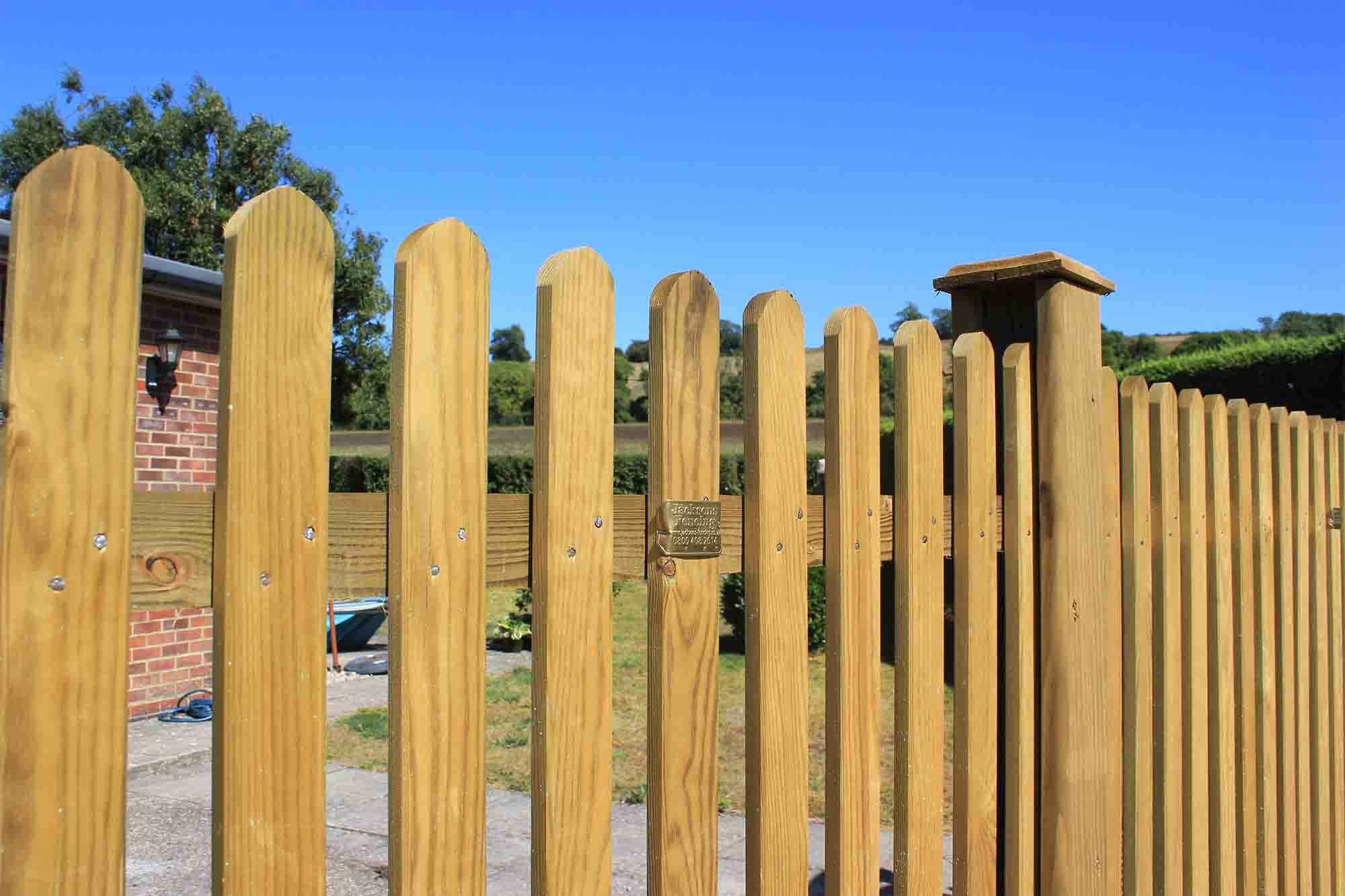 Mitre Topped Wooden Palisade Fence Panels | Jacksons Fencing