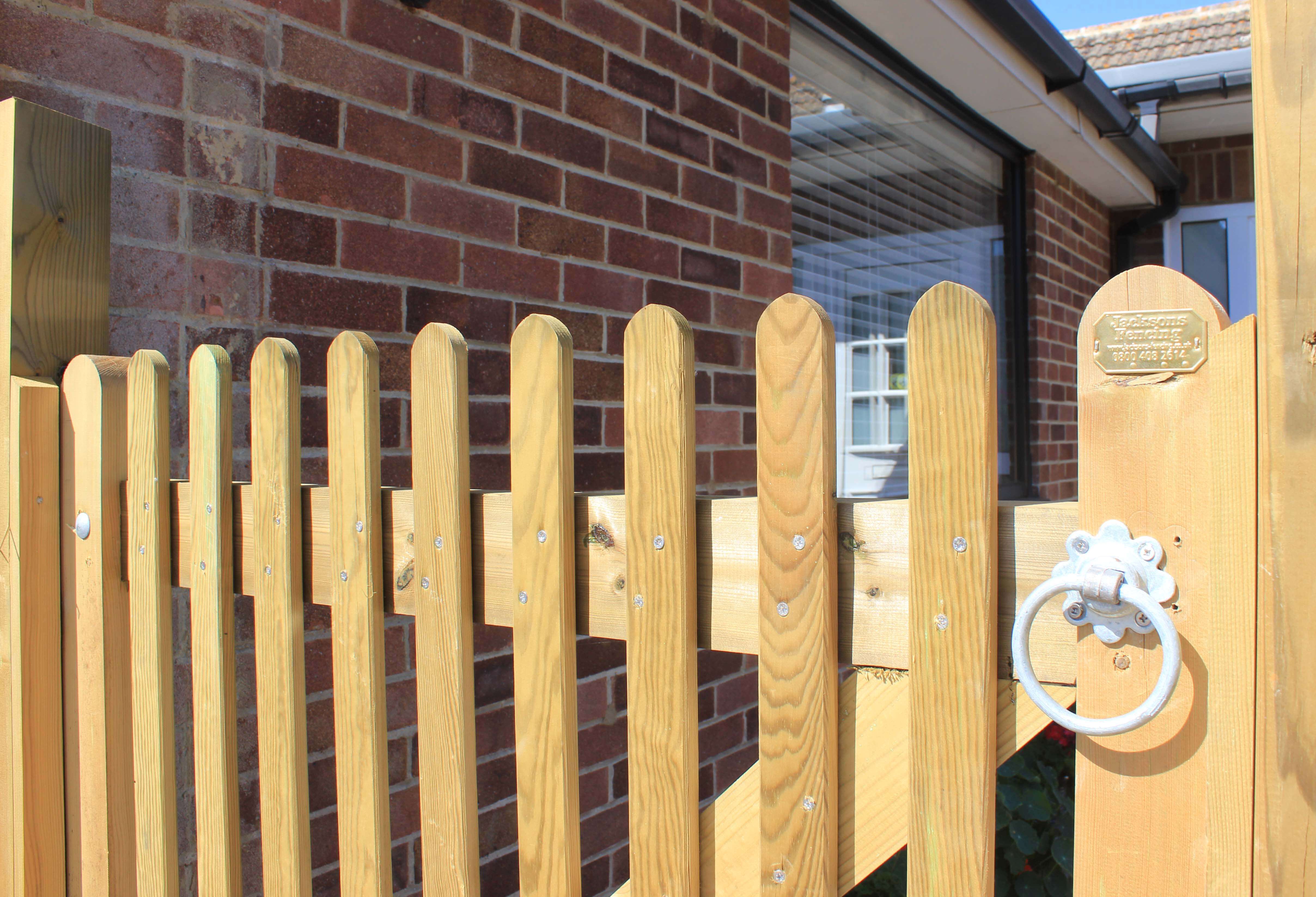 Mitre Topped Wooden Palisade Gates | Jacksons Fencing